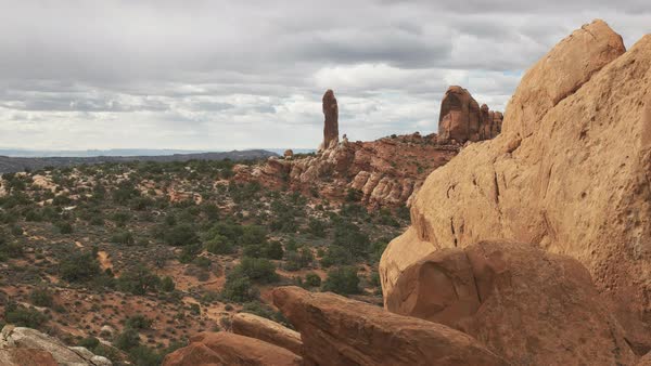 Zoom in on the rock spire named dark angel at arches national park in ...