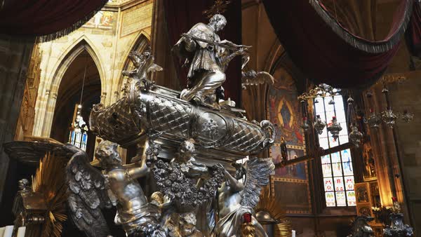 The silver statue on the tomb of john of nepomuk in st vitus cathedral ...