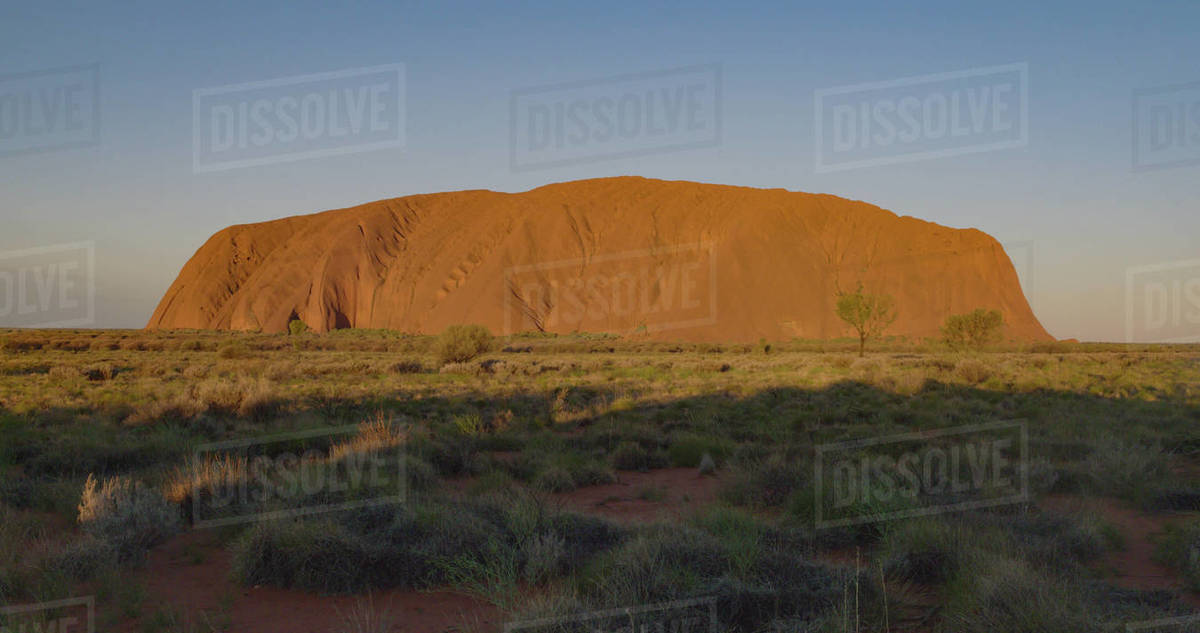 early sunset shot of uluru in uluru-kata tjuta national park of the ...