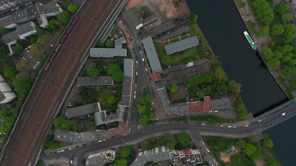 Aerial birds eye overhead top down view of multitrack railway line ...