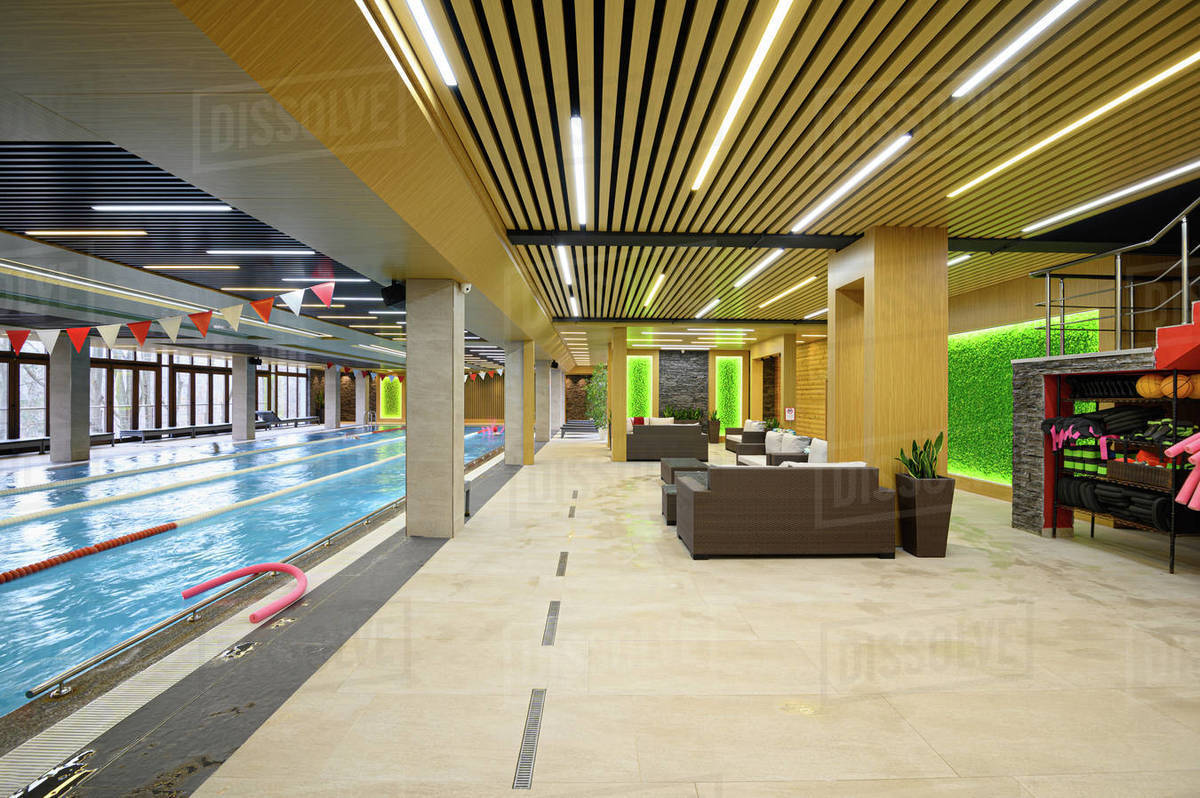 Luxury indoor swimming pool, beautiful interior of rest area with ...
