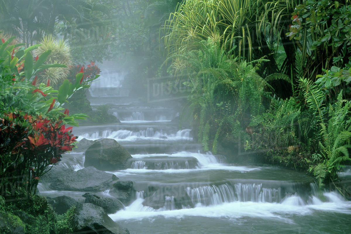 Costa Rica, Tabacon Hot Springs, below Arenal Volcano, tropical ...
