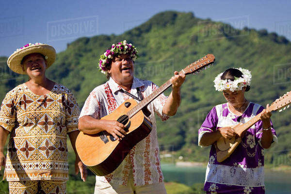 French Polynesia, Taha'a. Native musicians playing and singing ...