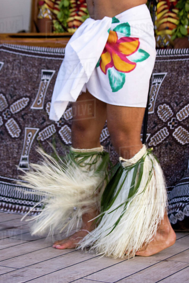 Polynesia, Cook Islands, Rarotonga. Native dancer's feet in motion ...