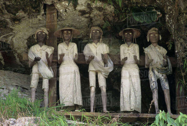Indonesia, Sulawesi, Tana Toraja region. Tau tau, effigies of departed ...