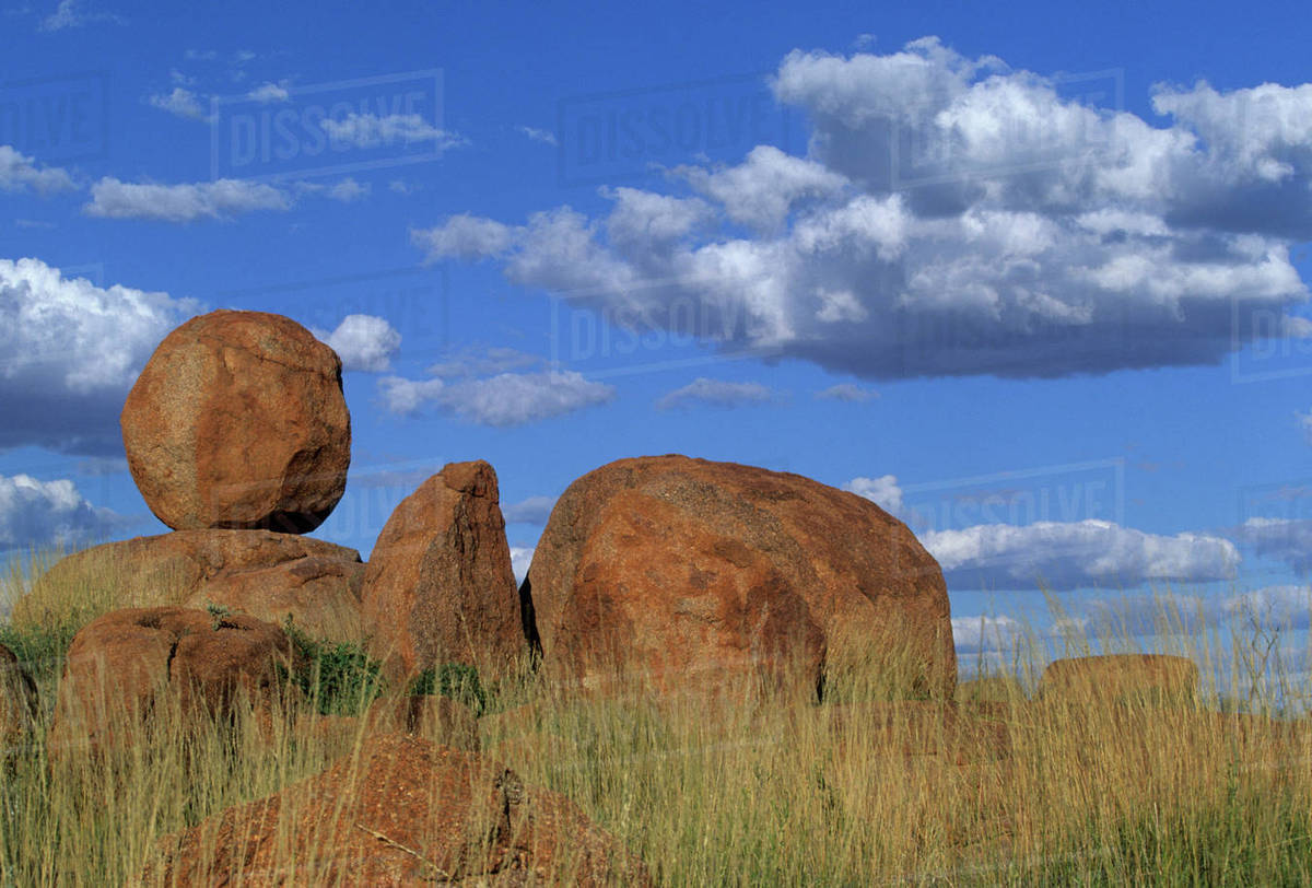 Australia, Devil's Marbles. Spherical sandstone boulders sculpted over ...