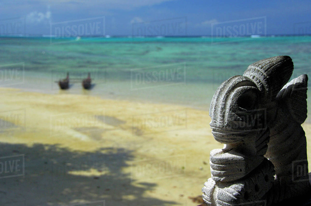 South Pacific, French Polynesia, Moorea. Stone Tiki with traditional ...