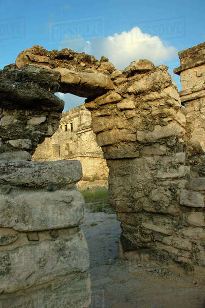 Mexico, Tulum, Stone archway at ruins - Stock Photo - Dissolve