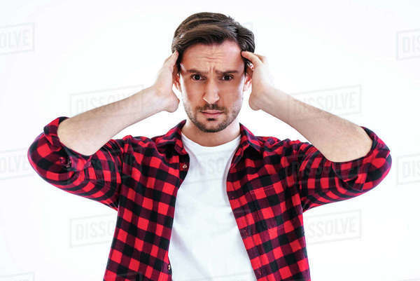 The man with a headache standing on the white background - Royalty-free ...