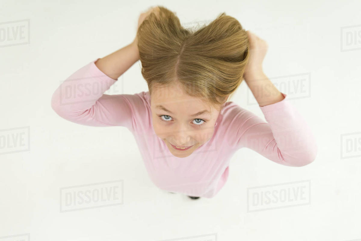 The happy girl hold her hair. View from above - Royalty-free Stock ...