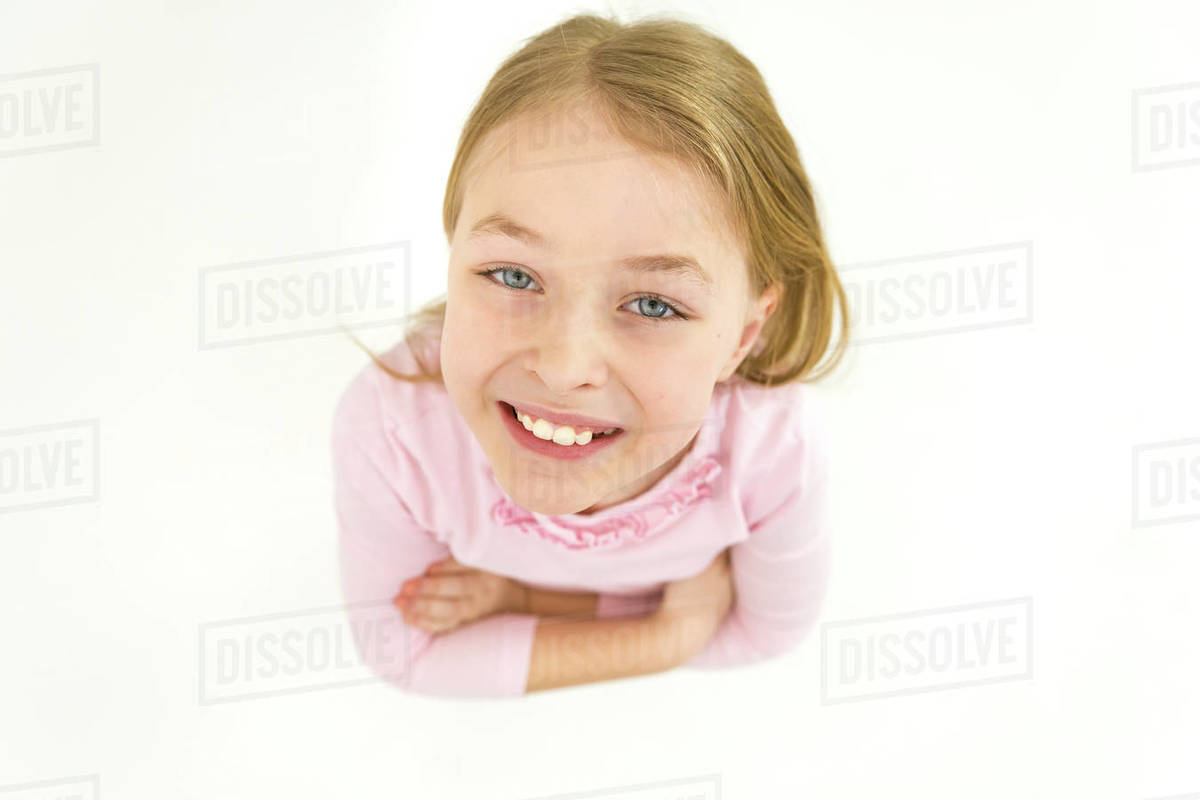 The cute girl look to the camera. View from above - Royalty-free Stock ...