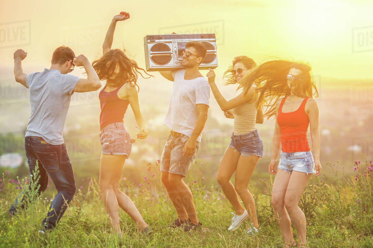 The five people dancing with a boom box on the mountain - Royalty-free ...