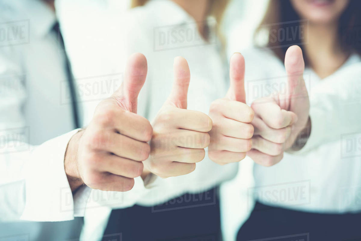The four people thumb up - Royalty-free Stock Photo | Dissolve