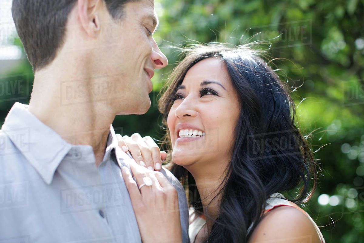 Engaged couple gazing at each other - Royalty-free Stock Photo | Dissolve