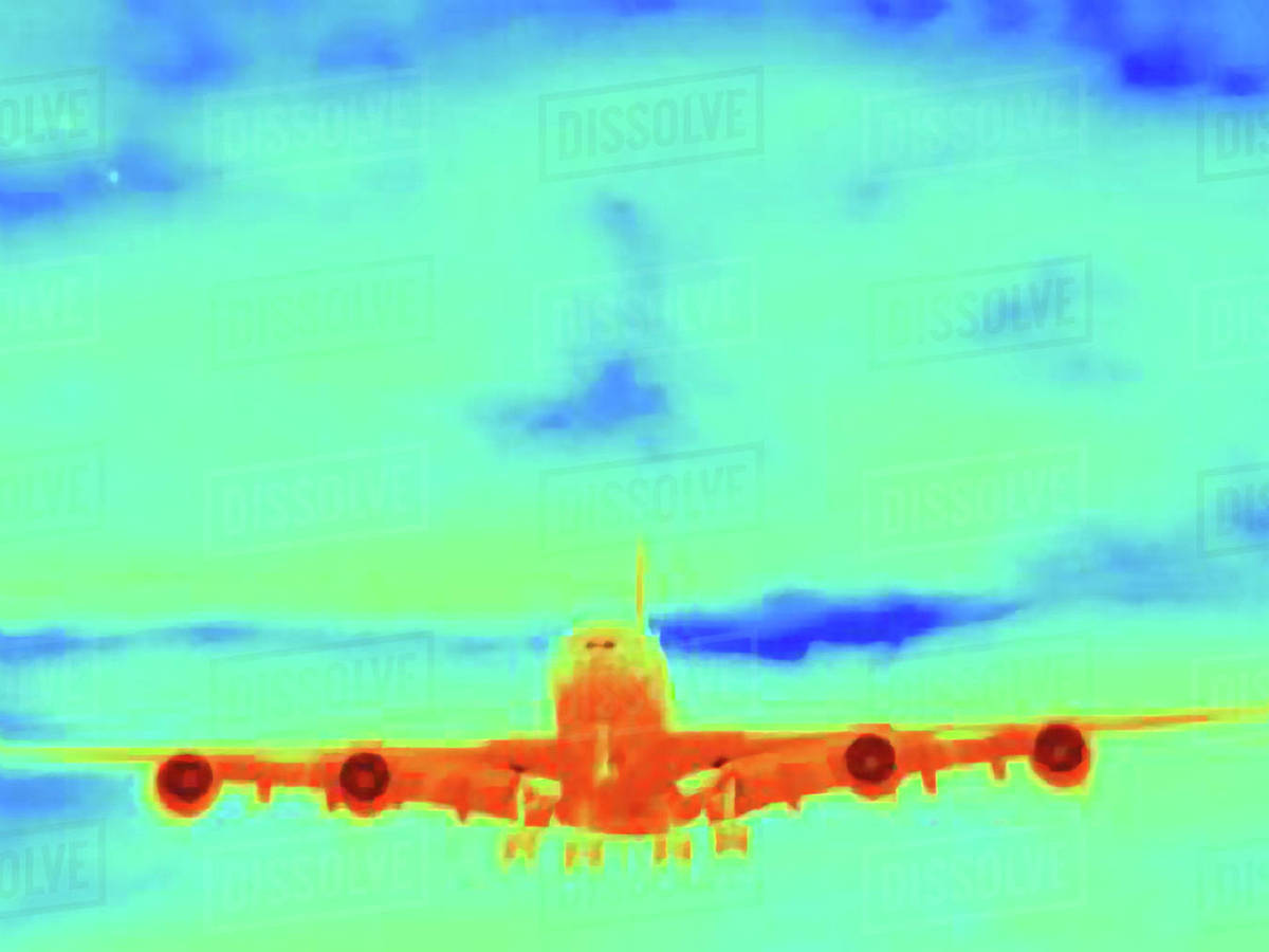 Thermal image of airplane in sky - Royalty-free Stock Photo | Dissolve