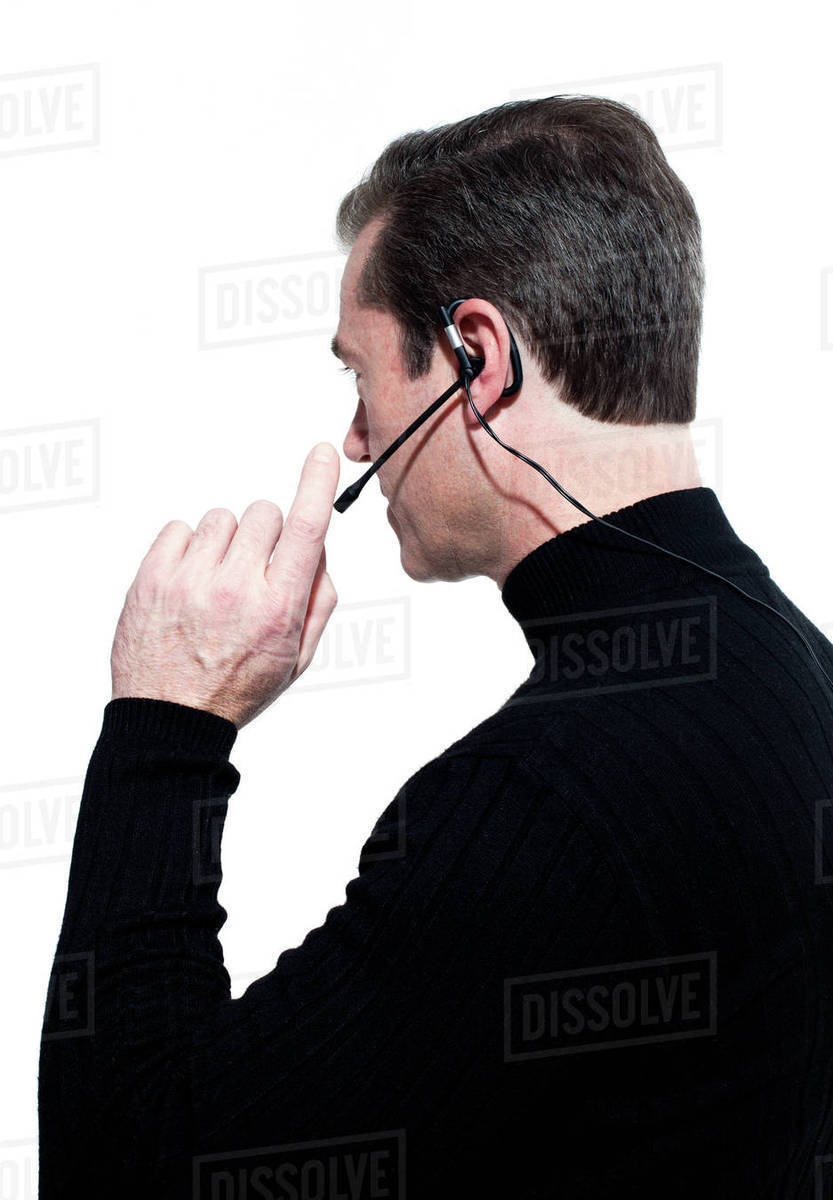 Man wearing headset - Royalty-free Stock Photo | Dissolve