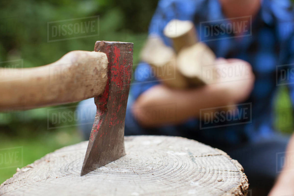 Cropped close up of axe in garden tree stump - Royalty-free Stock Photo ...