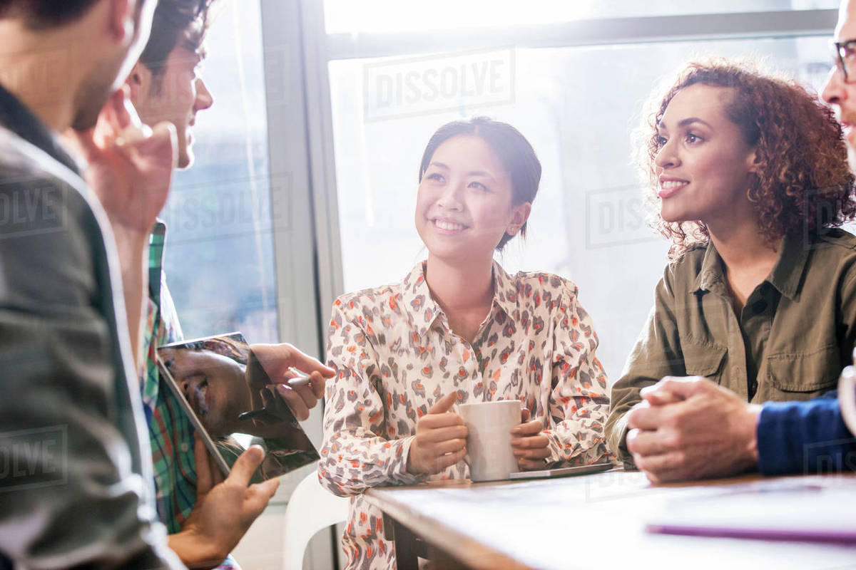 Digital design team meeting in office - Royalty-free Stock Photo | Dissolve