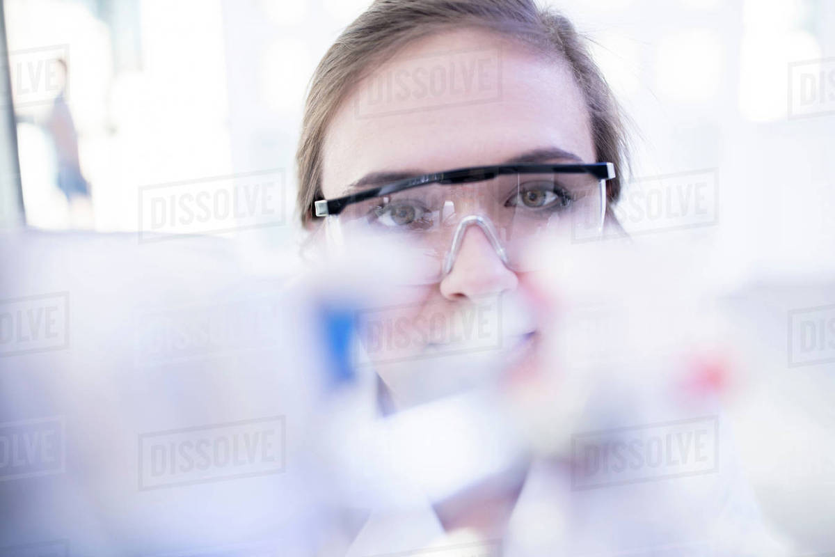 Laboratory worker looking at laboratory equipment - Royalty-free Stock ...