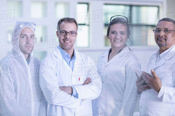 Portrait of four laboratory workers in lab - Royalty-free Stock Photo ...