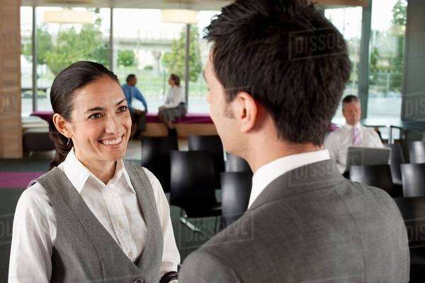 Businesspeople having conversation, high angle - Royalty-free Stock ...