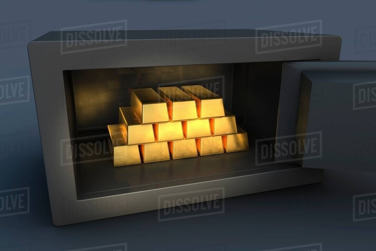 Gold ingots inside open security safe - Royalty-free Stock Photo | Dissolve