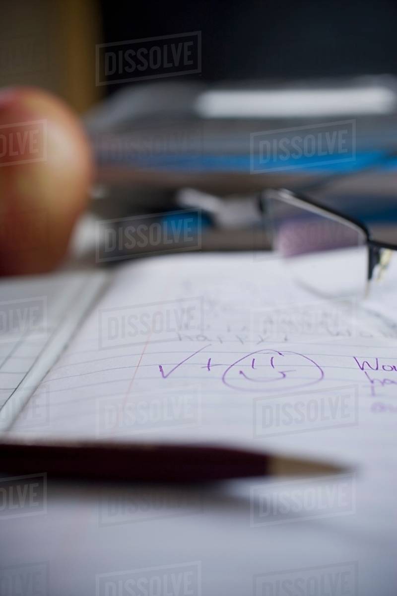 Marked school notebook with smiley face - Royalty-free Stock Photo ...