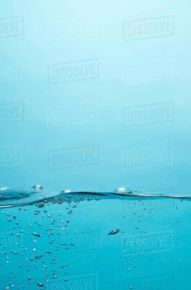 Bubbles floating in water - Stock Photo - Dissolve