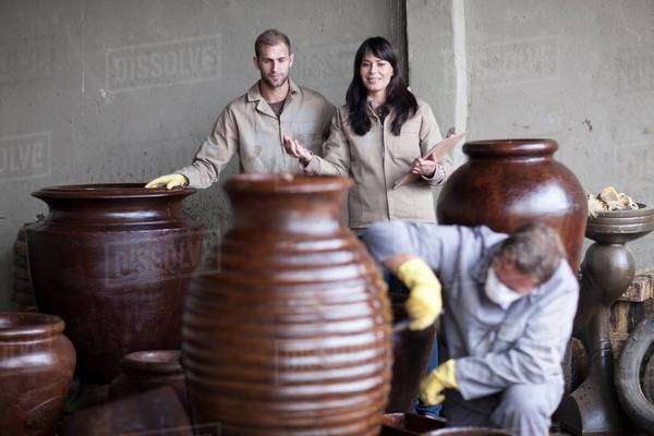 Painting and staining process in pottery factory - Royalty-free Stock ...