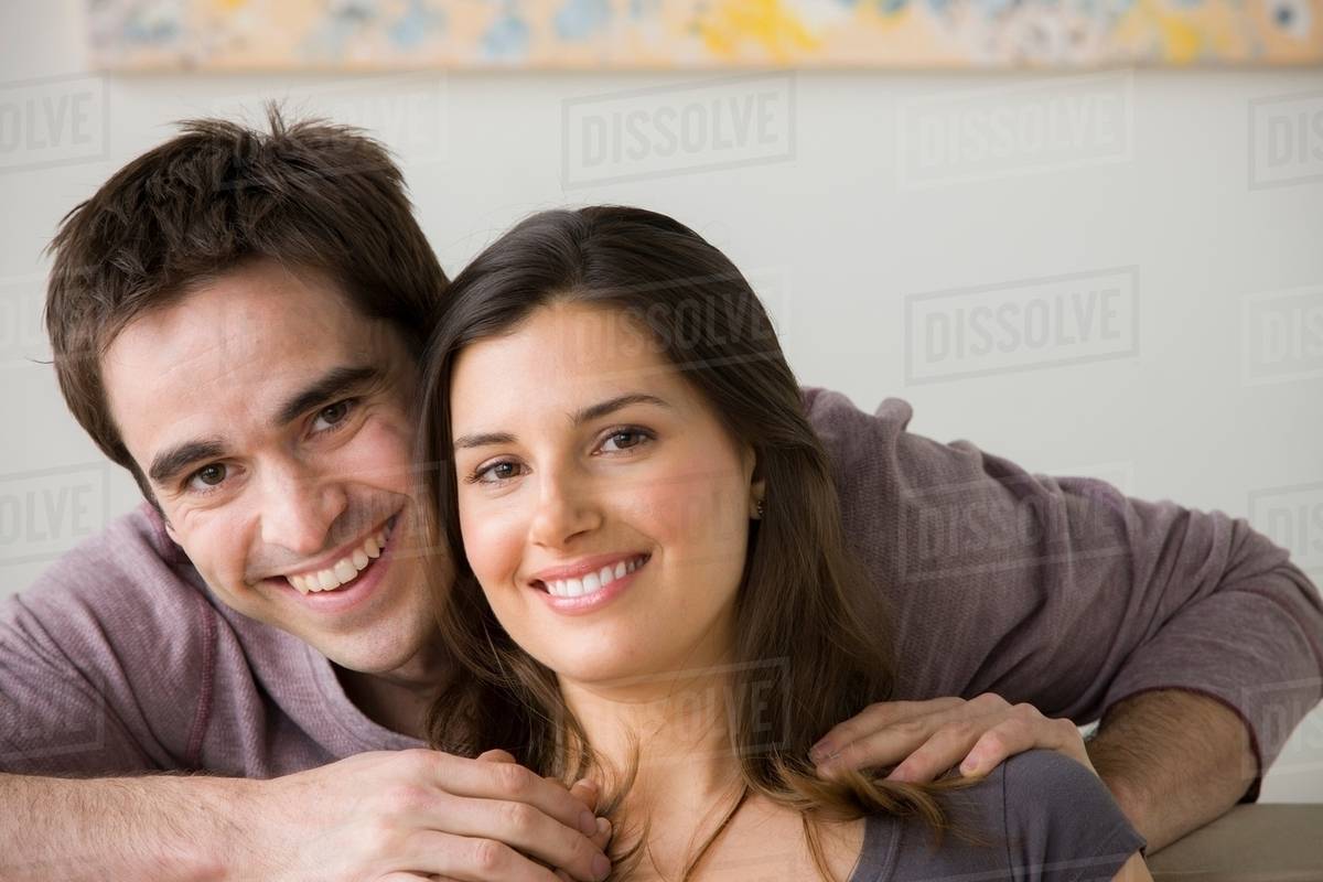 Portrait of couple, man with hand on woman's shoulder - Royalty-free ...