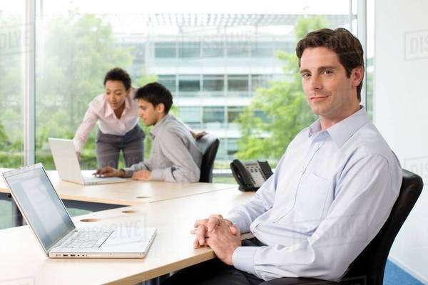 Office worker at desk - Royalty-free Stock Photo | Dissolve