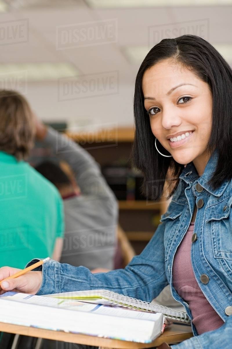 Girl in class - Stock Photo - Dissolve