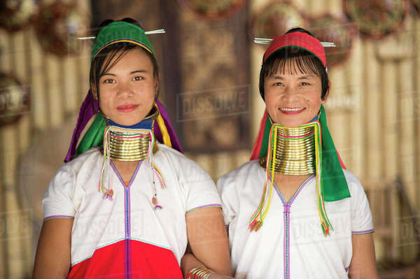 Portrait of two women in traditional clothing, Inle lake, Burma ...