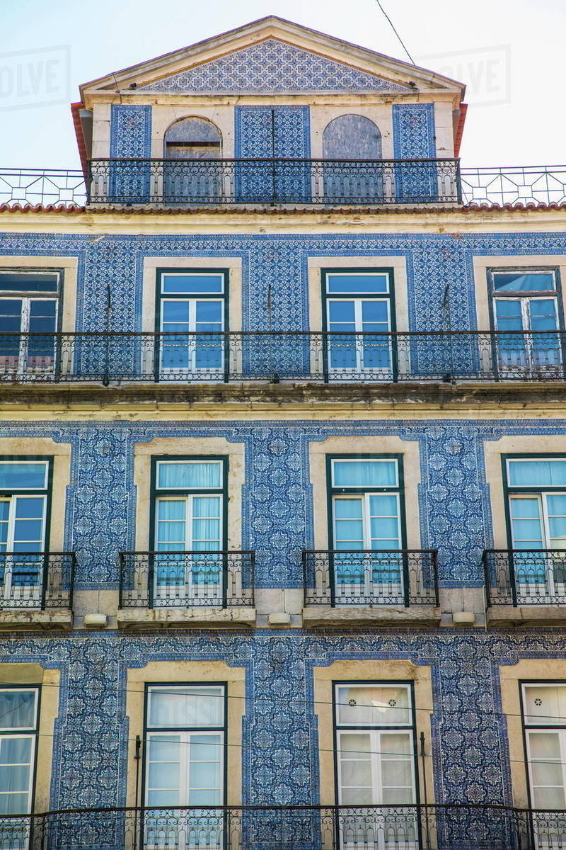 Facade of tiled building, Lisbon, Portugal - Stock Photo - Dissolve