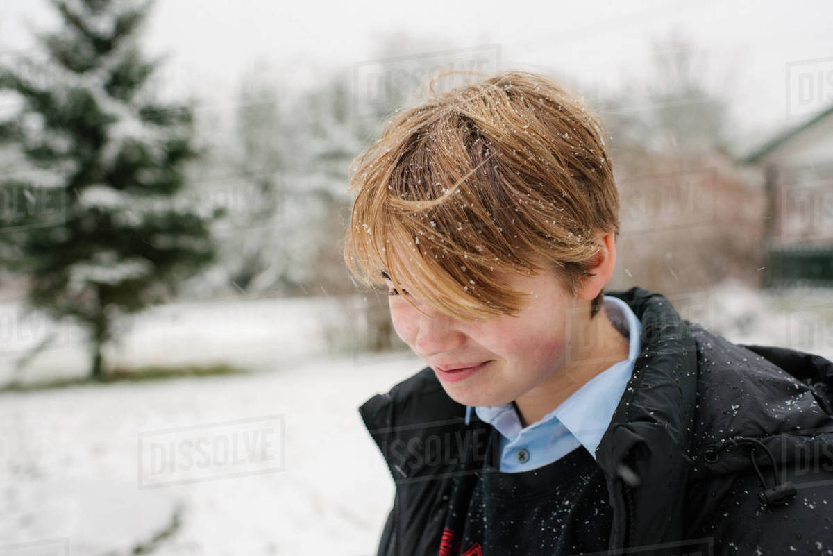 Canada, Ontario, Boy (14-15) playing in snow - Royalty-free Stock Photo ...