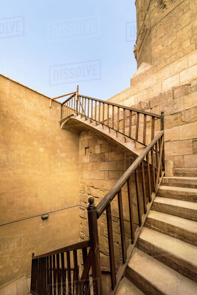 Egypt, Cairo, Wooden staircase in stone building in Islamic district ...