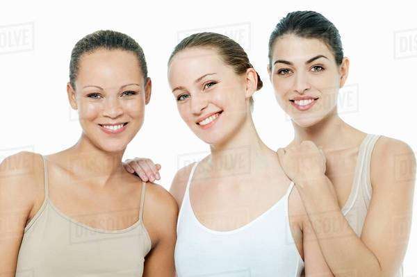 Three young women together - Stock Photo - Dissolve