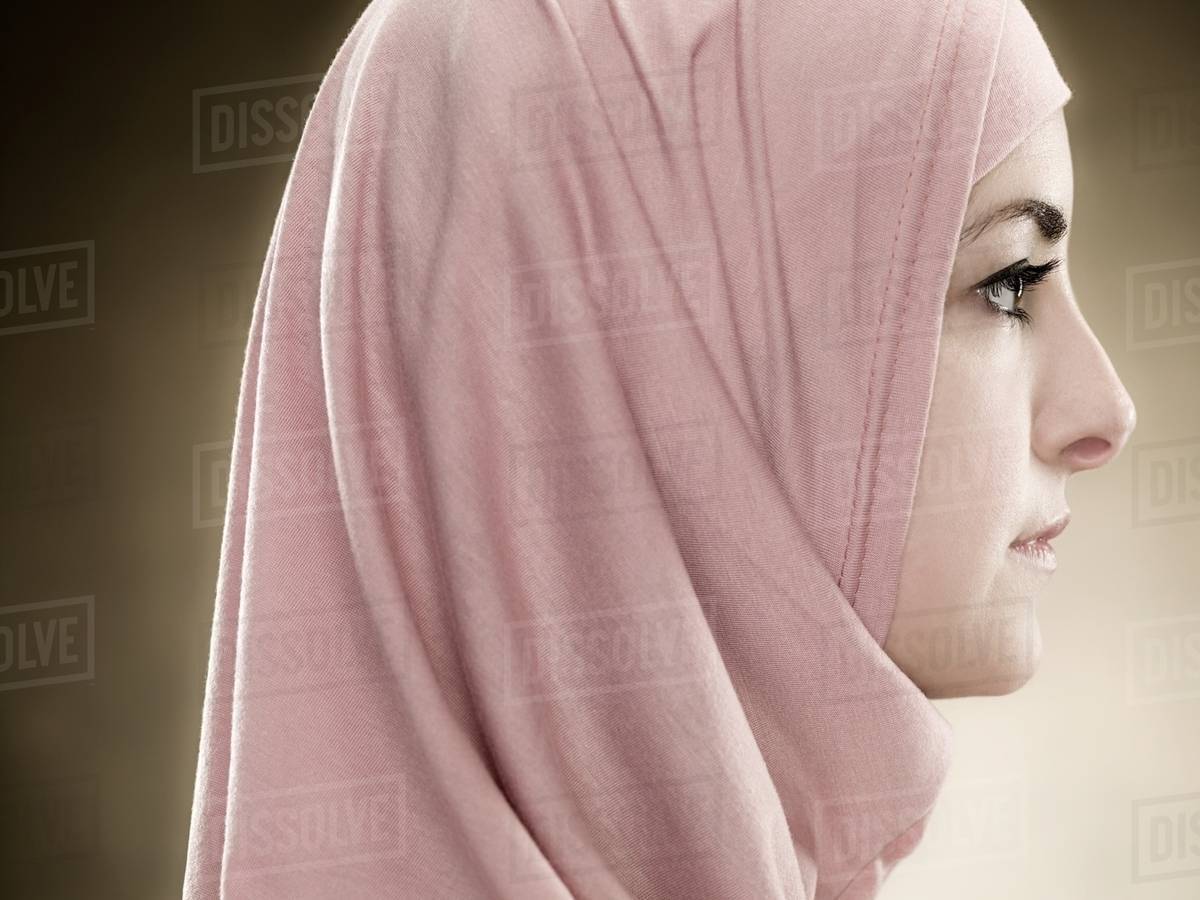 Profile of a young muslim woman - Stock Photo - Dissolve