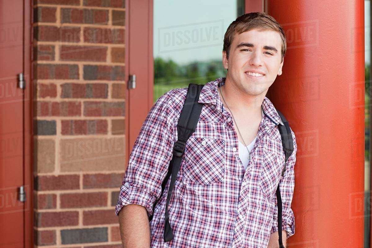 Portrait of male high school student - Stock Photo - Dissolve