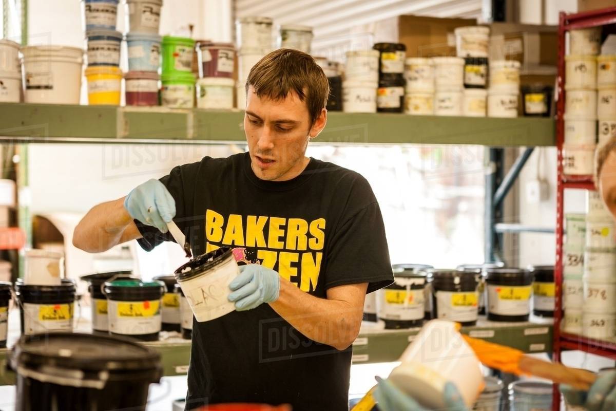 Worker mixing ink in screen print workshop - Royalty-free Stock Photo ...