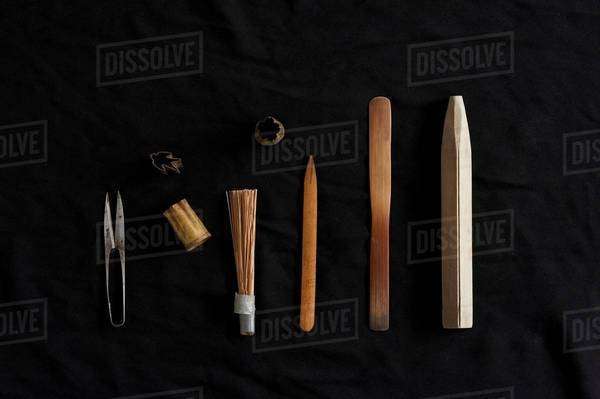 Traditional Japanese tools on black background - Stock Photo - Dissolve