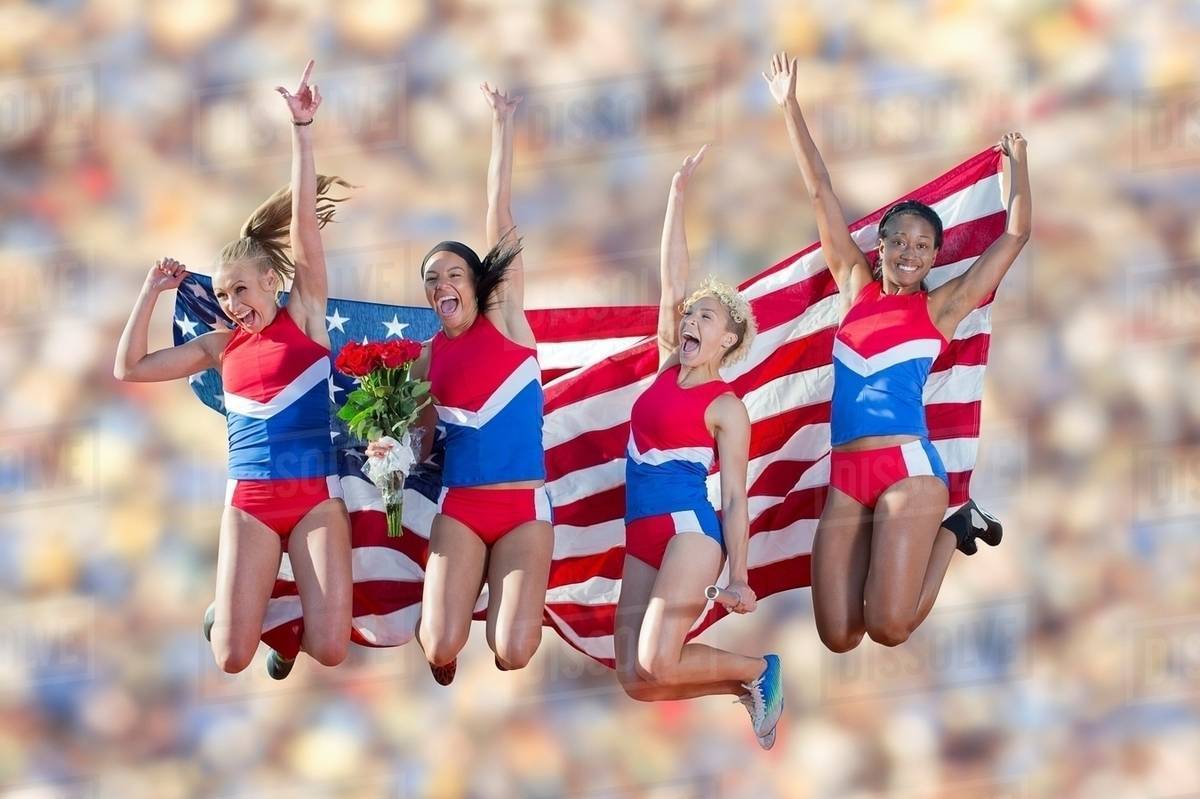 Four American athletes celebrating - Royalty-free Stock Photo | Dissolve