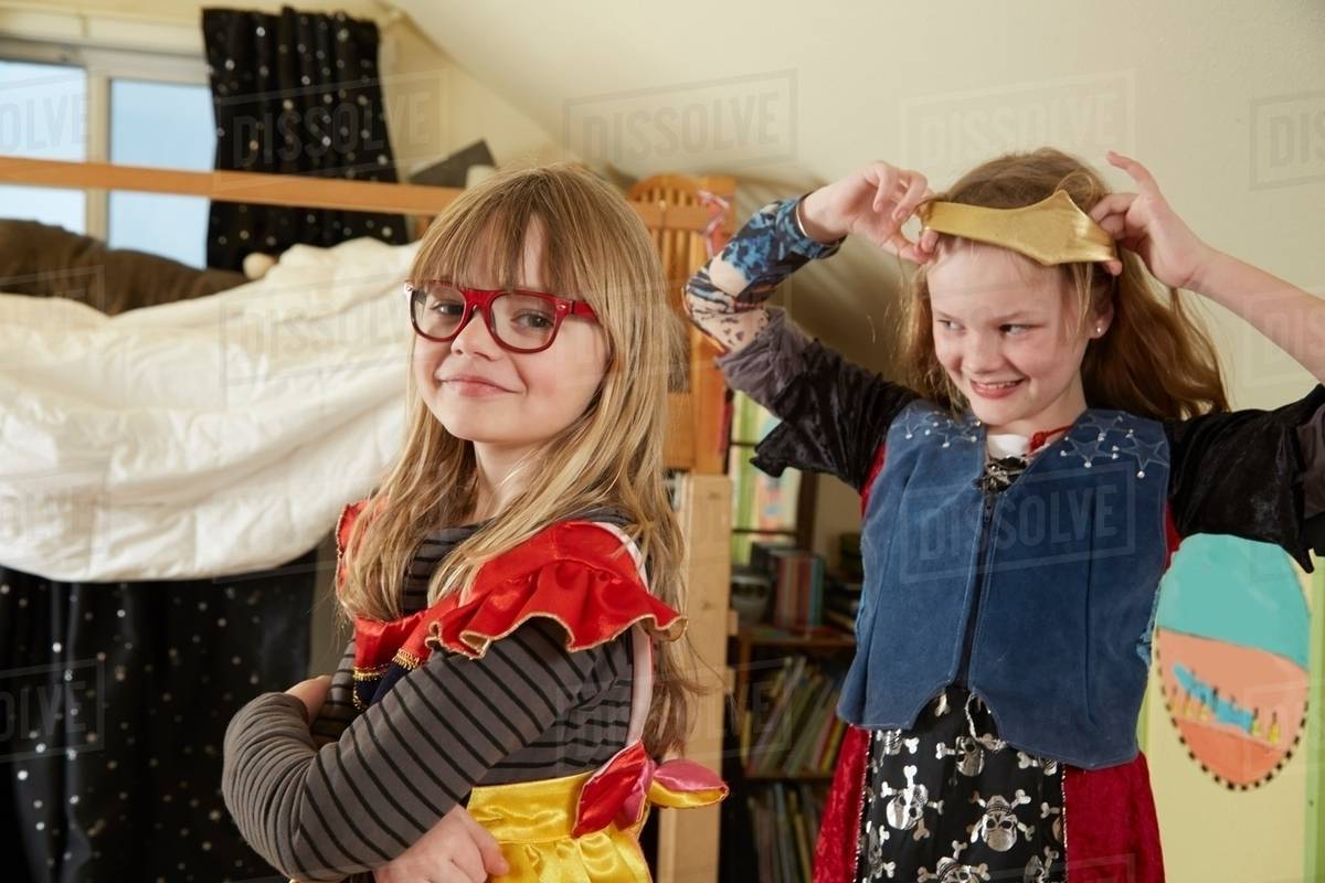 Two sisters playing dress up - Royalty-free Stock Photo | Dissolve