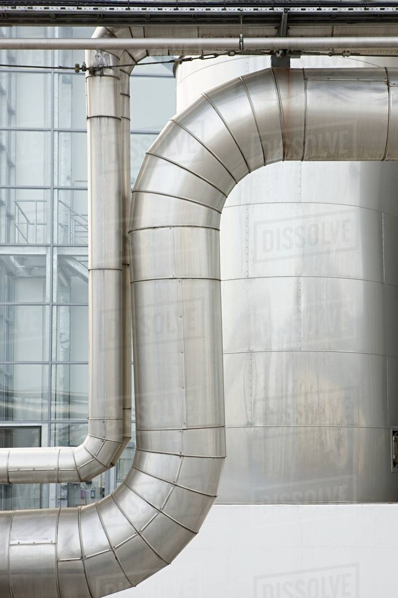 Curved industrial piping - Royalty-free Stock Photo | Dissolve