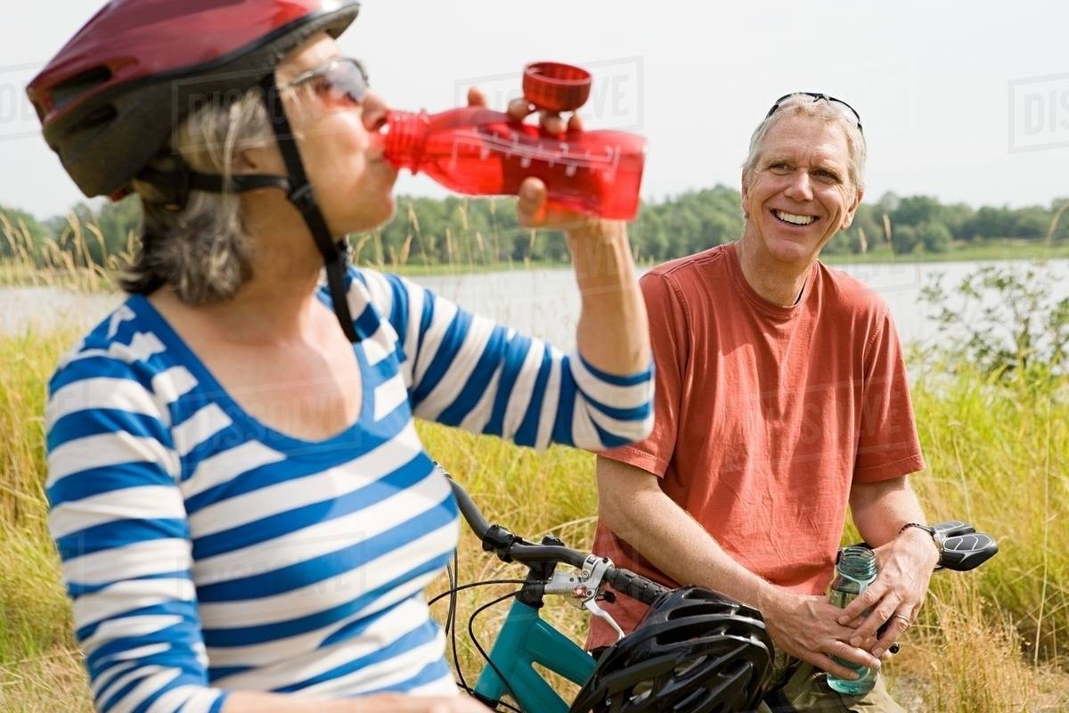 Cyclist drinking - Royalty-free Stock Photo | Dissolve