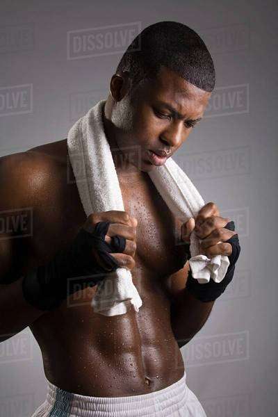 Portrait of a man drying himself with a towel - Royalty-free Stock ...