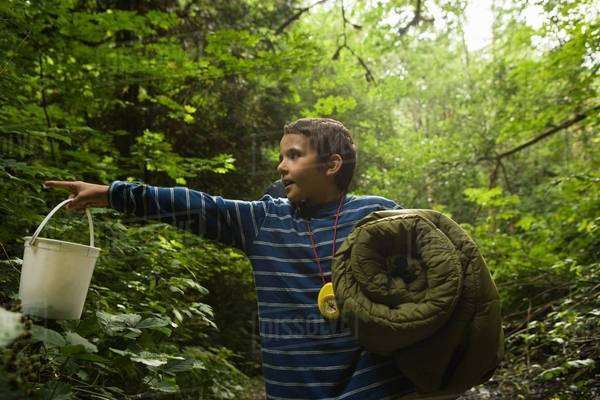 Boy in forest - Stock Photo - Dissolve