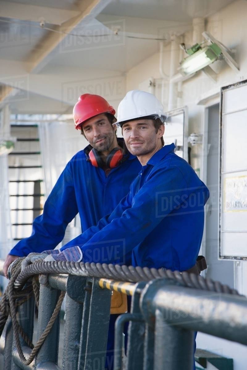 Portrait of two harbour workers - Royalty-free Stock Photo | Dissolve