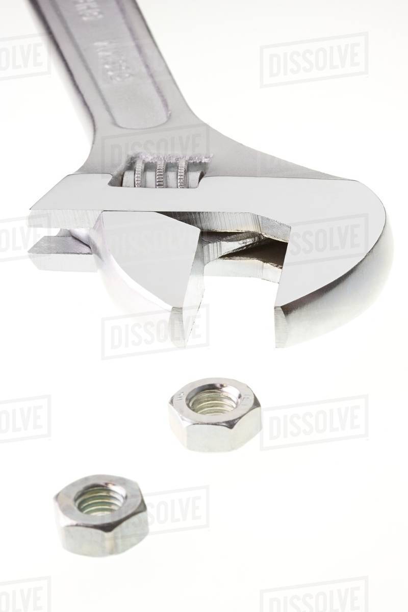 Spanner and metal nuts - Royalty-free Stock Photo | Dissolve