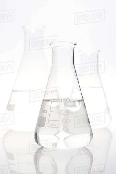 Three volumetric flasks - Royalty-free Stock Photo | Dissolve